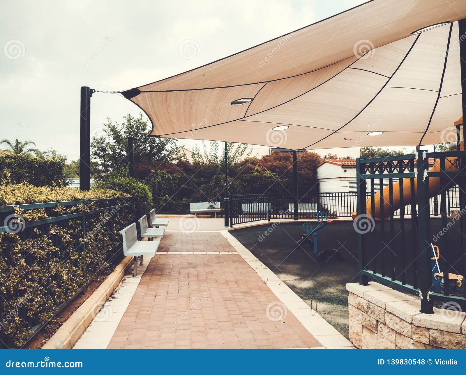 Children`s Playground are Shadow Under a Tent Stock Photo - Image of ...