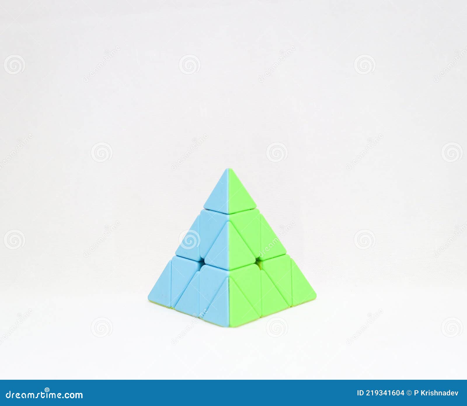 Children Pyramid Cube Puzzle Solved Stock Photo - Image of green ...