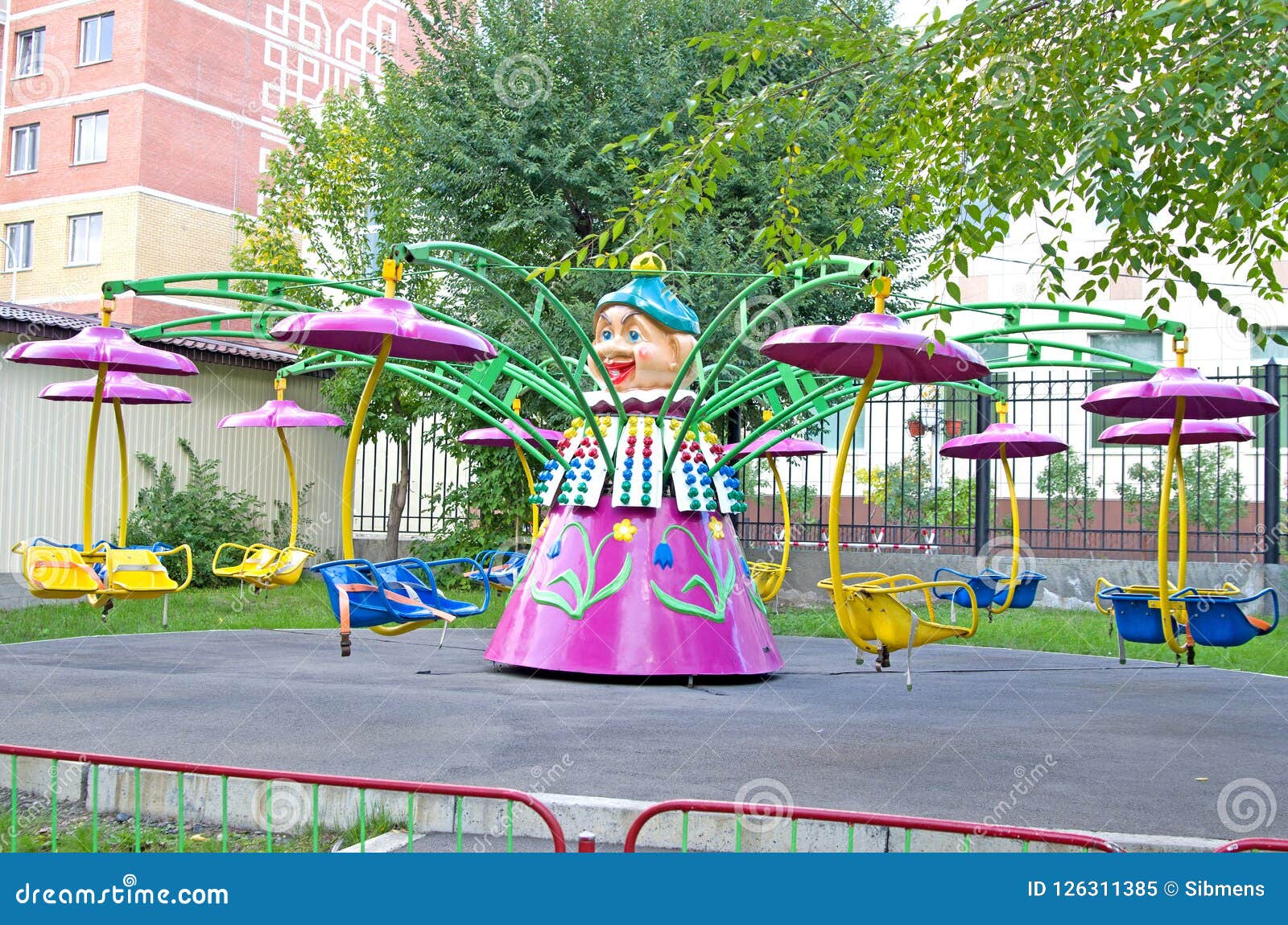 Children`s Revolving Carousel in the Park. Stock Image - Image of ...
