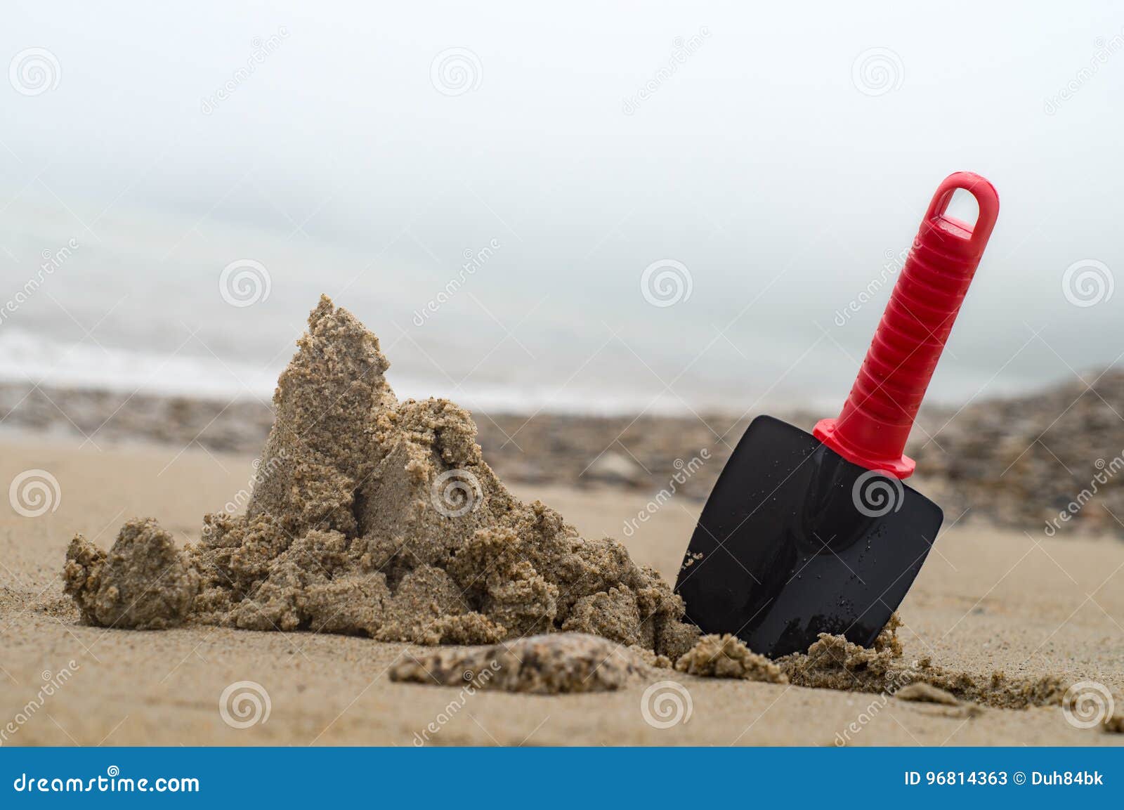 Children& X27;s Shovel in the Sand Stock Image - Image of bucket ...