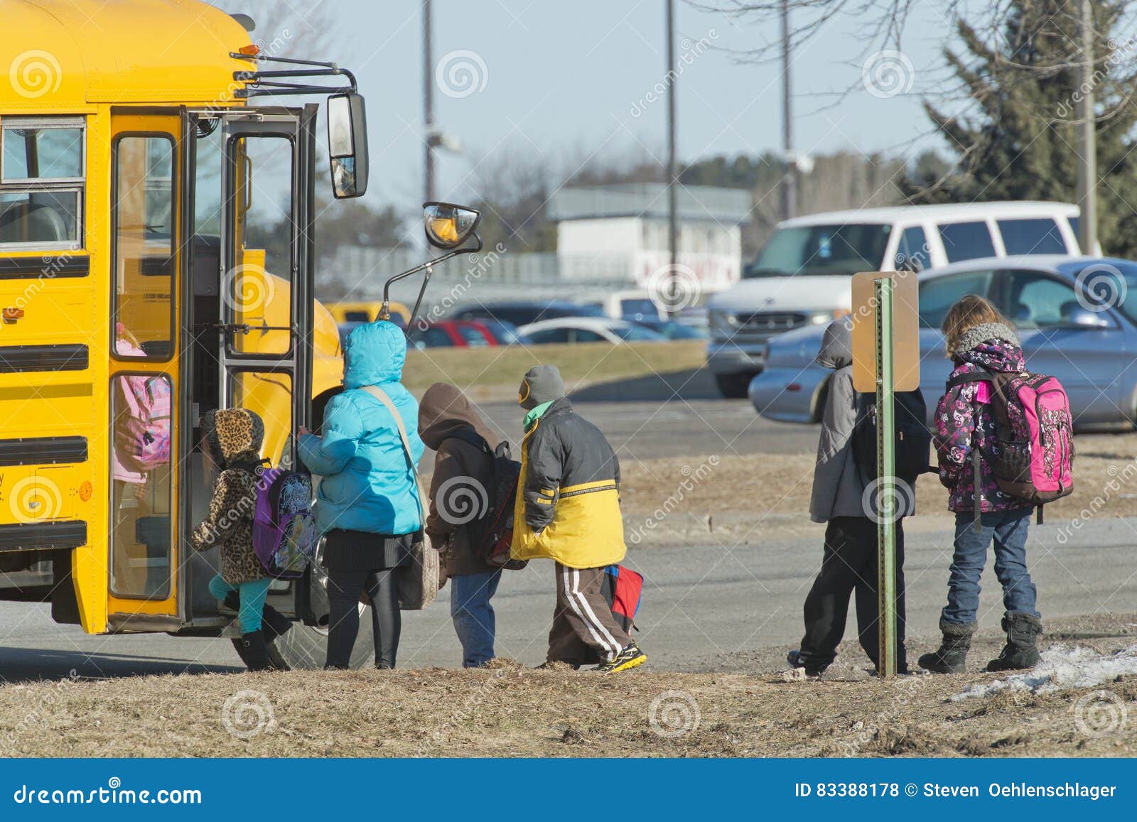 Children at the School Bus on a Cold Morning Editorial Stock Photo ...