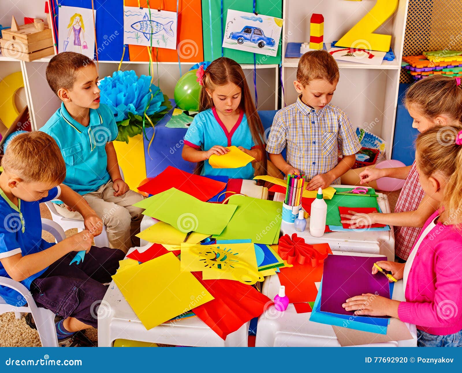 Children School are Making Something Out of Colored Paper. Stock Photo ...