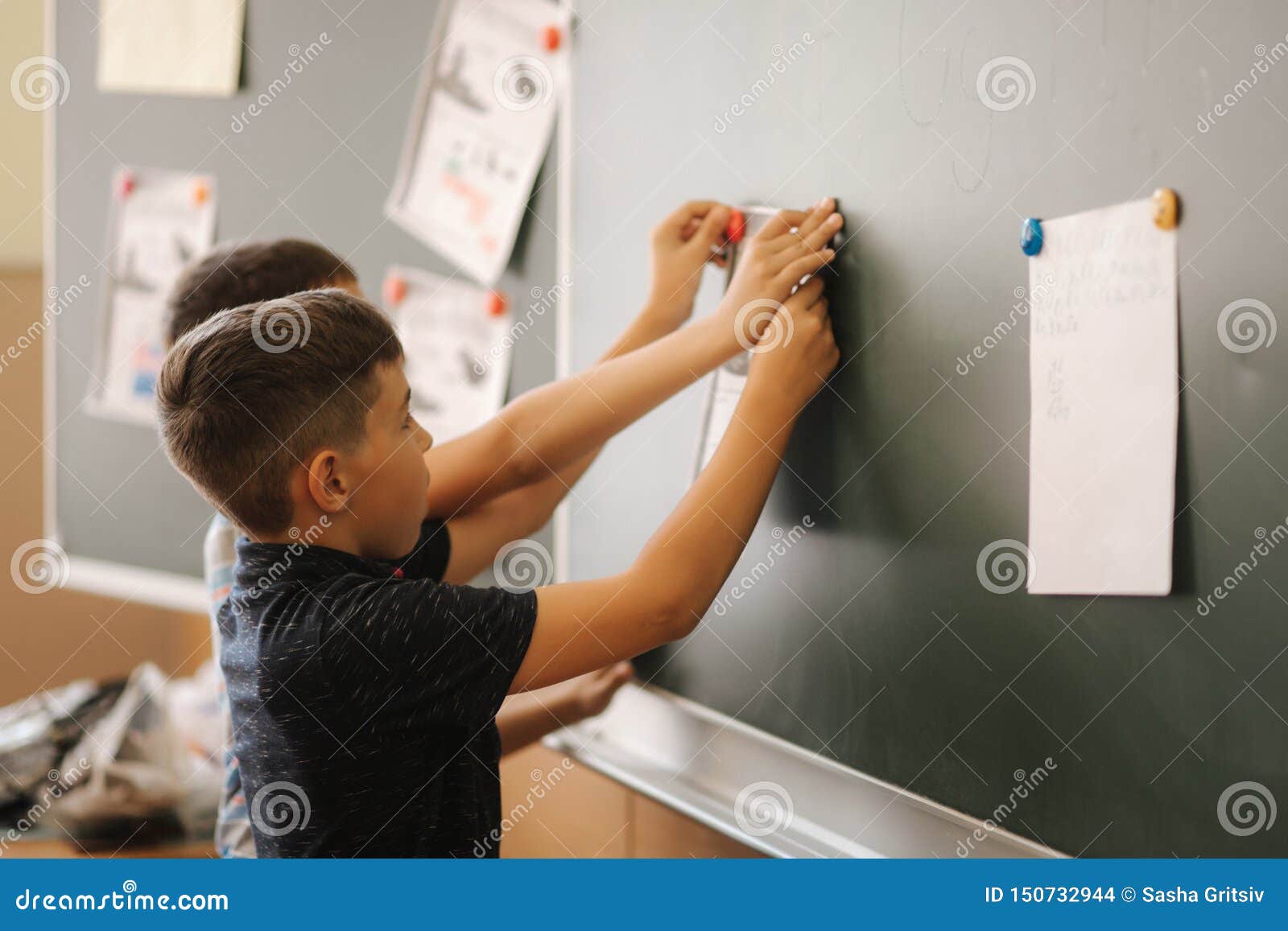 Children in School Stand by the Blackboard. Elementary School Stock ...