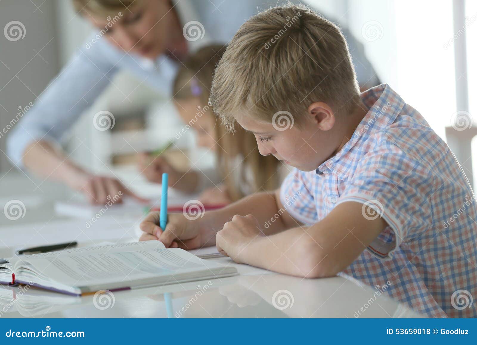 Children at School Writing Down Stock Photo - Image of pupil, classroom ...