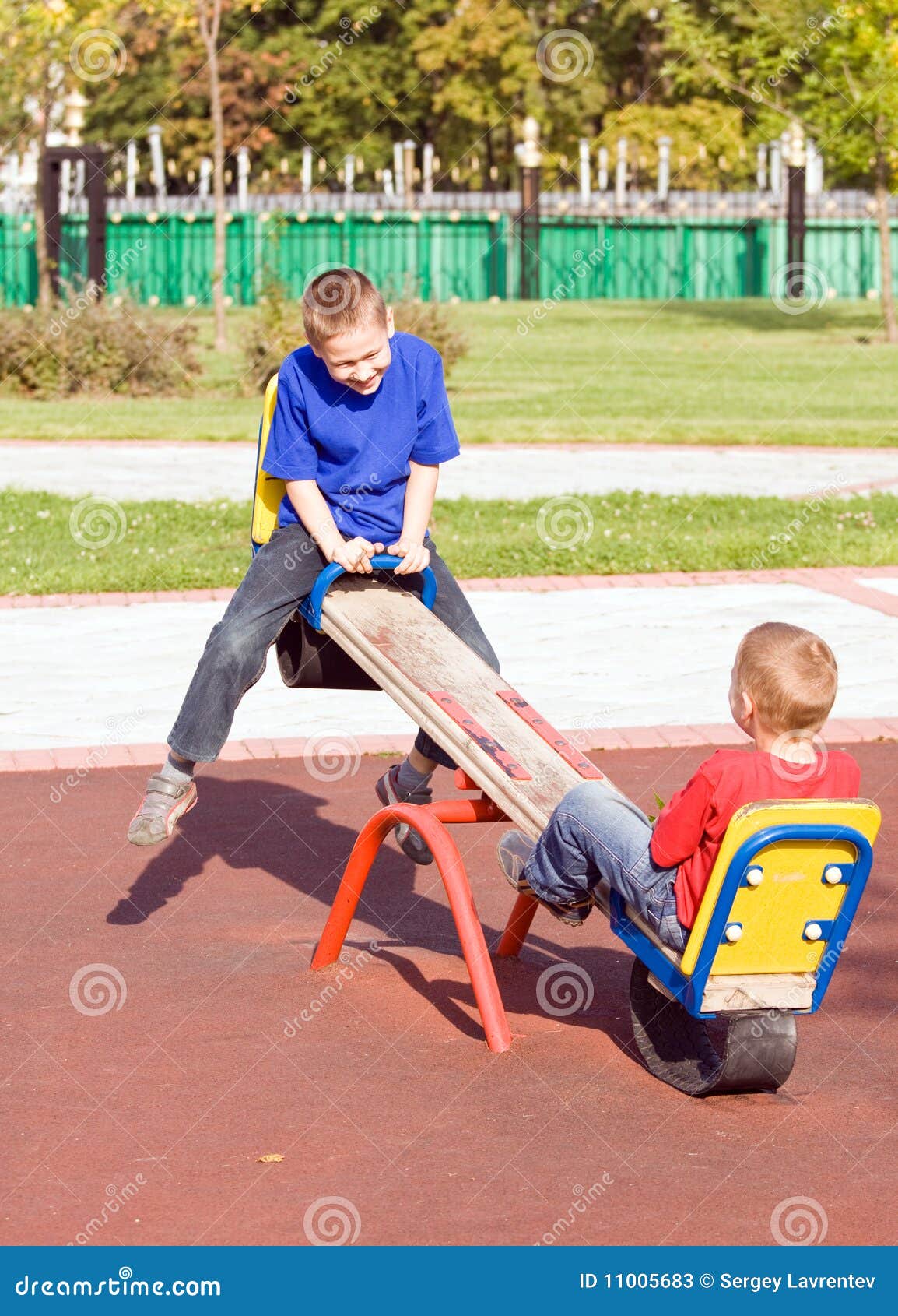 Children On A Seesaw Royalty-Free Stock Photo | CartoonDealer.com #11005683