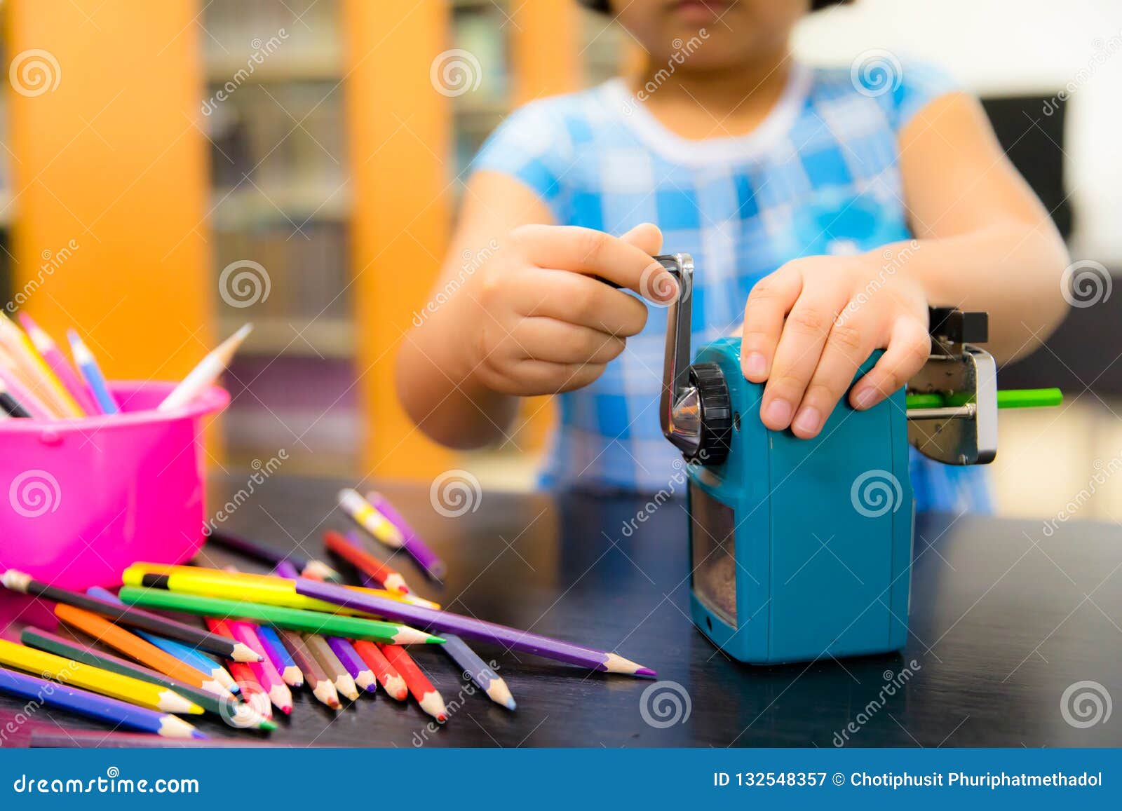 Children are Sharpening Crayons in the Library Stock Image - Image of ...
