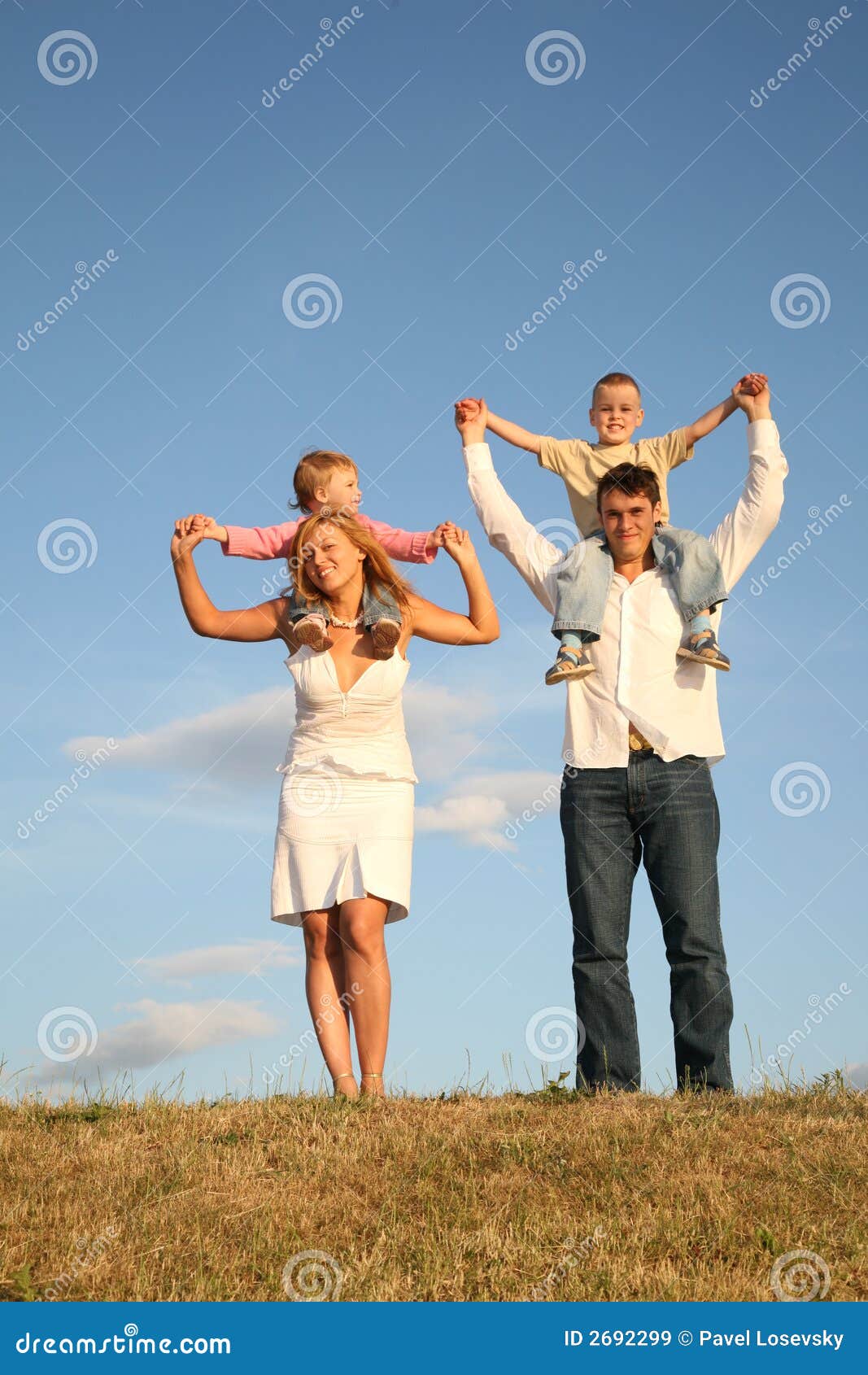 Children on shoulders 2 stock image. Image of playful - 2692299