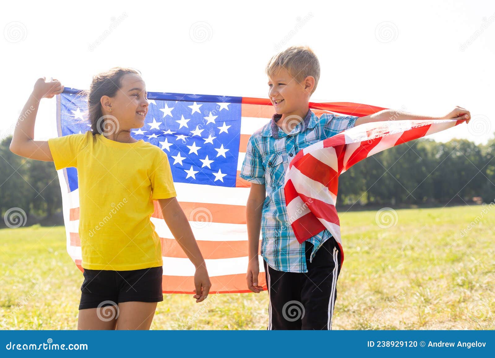 Children Sit with American Flag Outdoors. Stock Photo - Image of ...