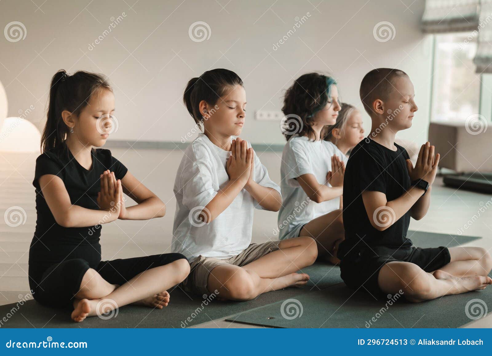 Children Sit on Mats in the Lotus Position in Yoga Classes. Children S ...