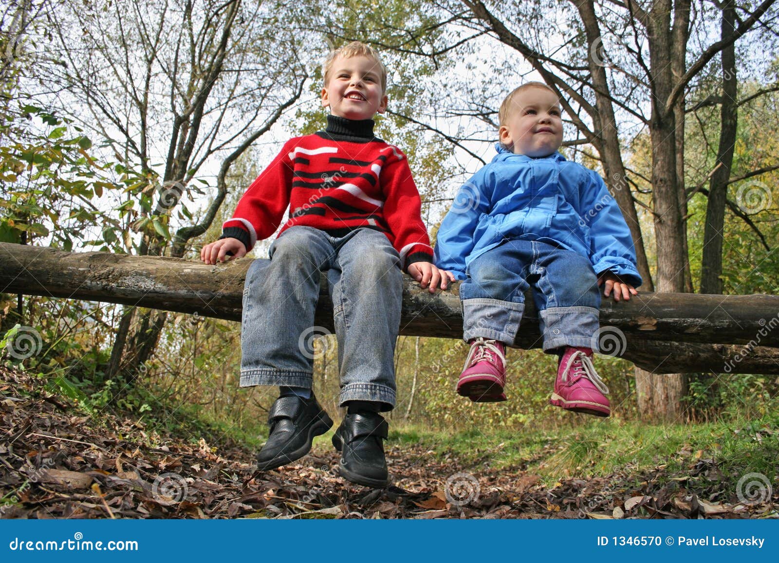 Children sit in park stock photo. Image of leaf, couple - 1346570