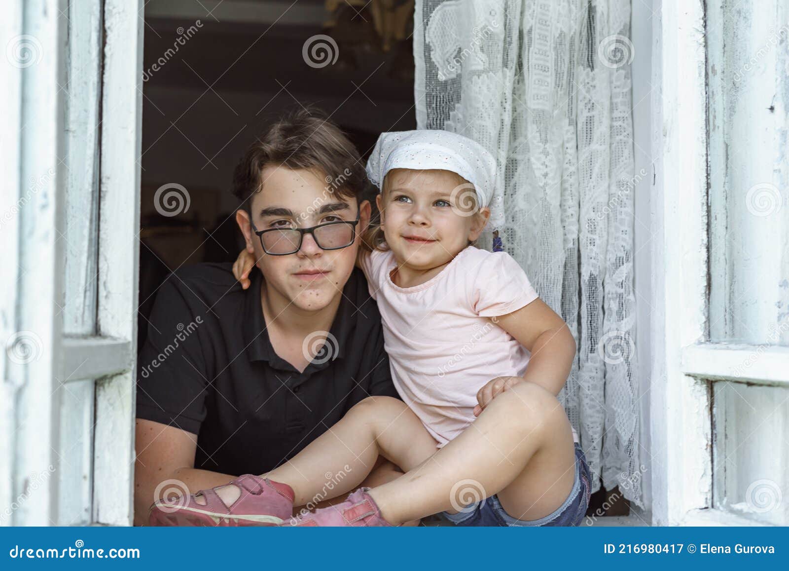 Children Sit on the Window of a Village House Stock Image - Image of ...