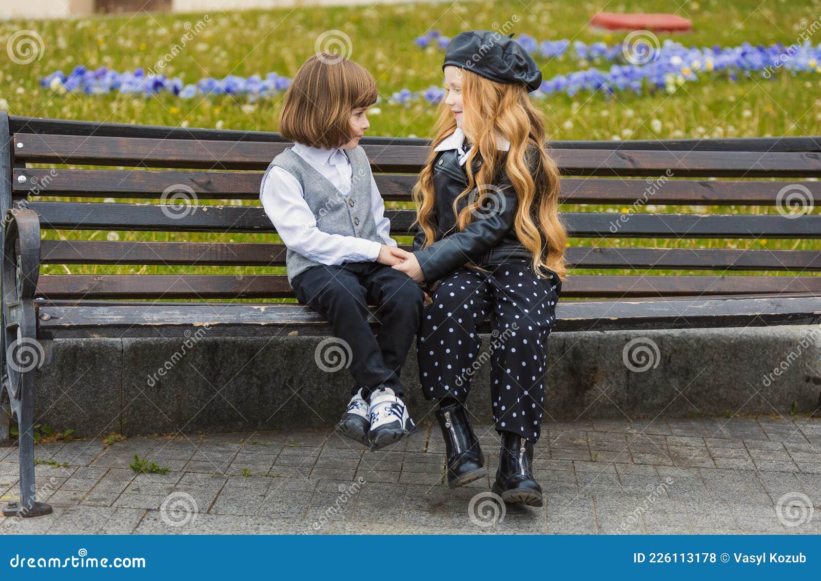 Children are Sitting on a Bench Stock Photo - Image of landscape ...