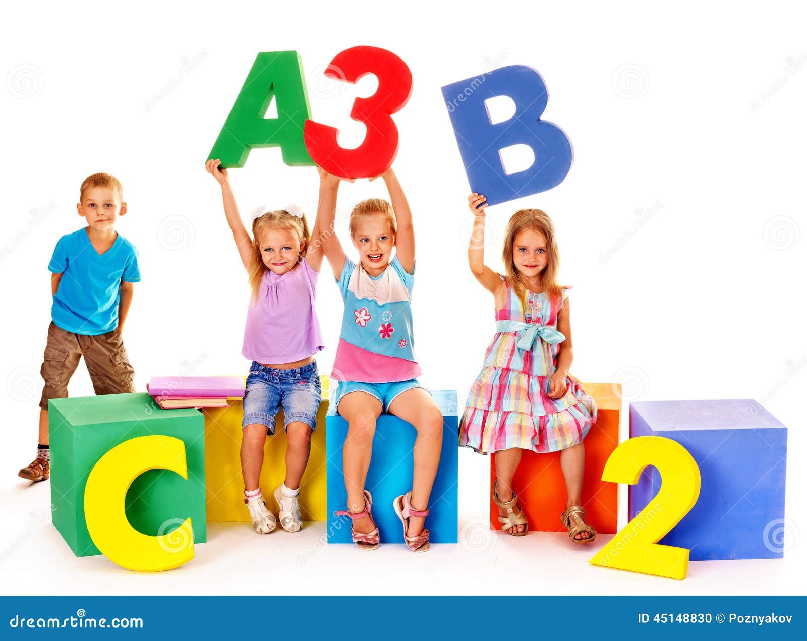 Children sitting at cube. stock photo. Image of colorful - 45148830