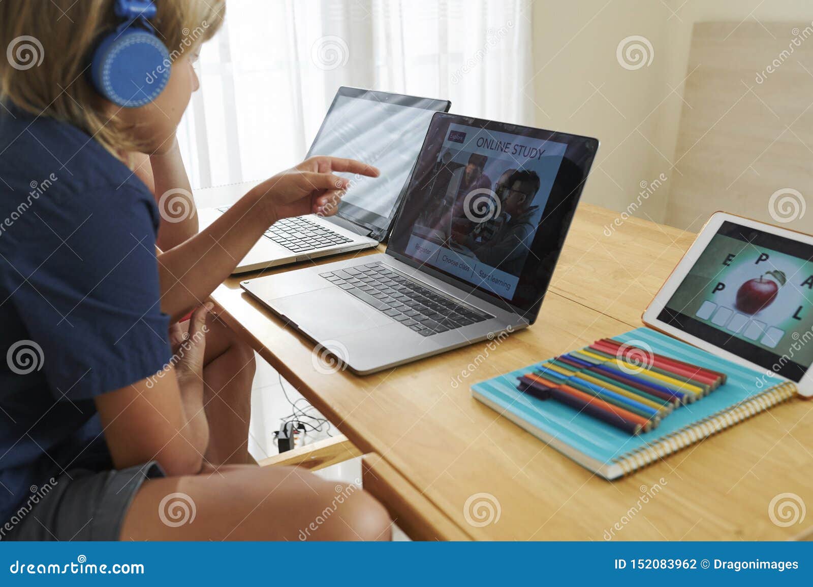 Children studying online stock photo. Image of table - 152083962
