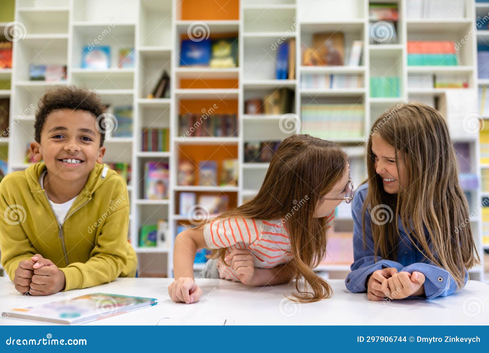 Children Sitting in School Library Having Fun while Break Stock Photo ...