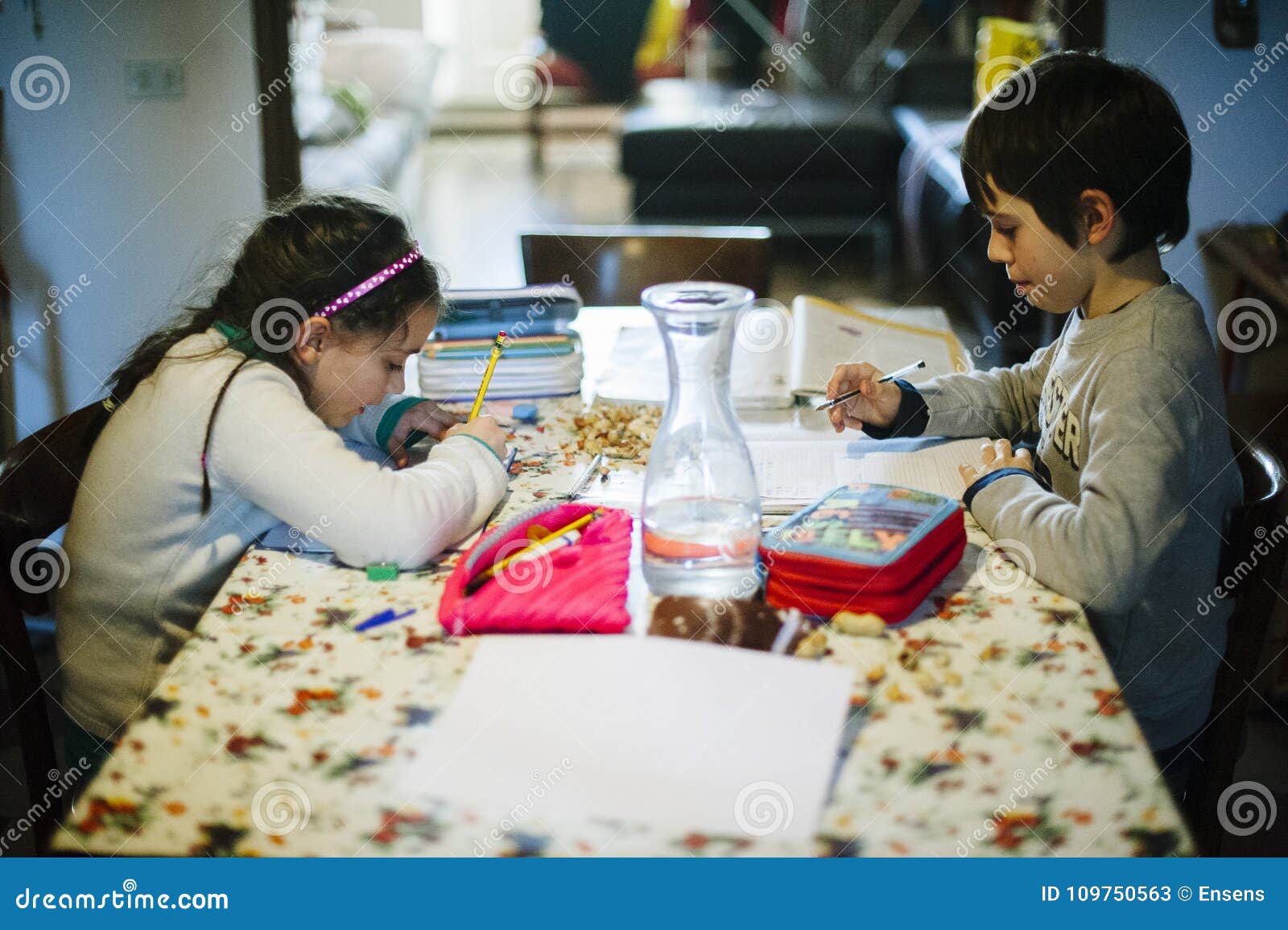 Children Sitting at the Table at Home Perform Homework Stock Image ...