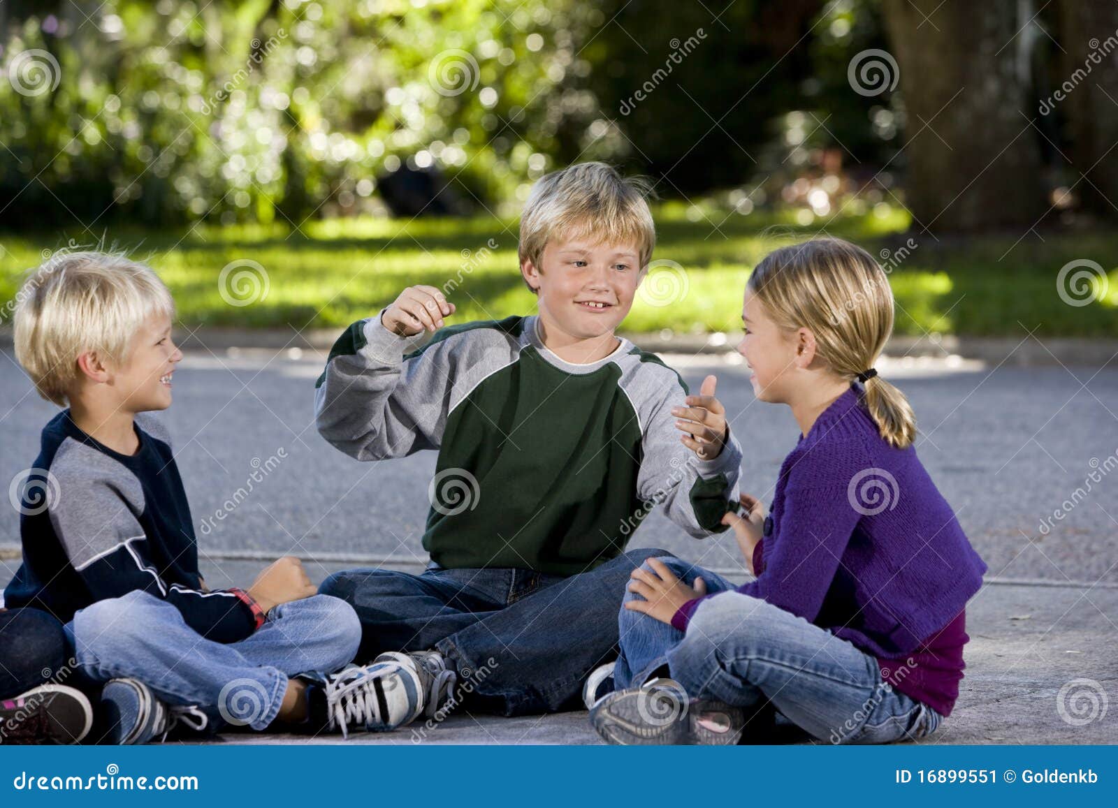 Children Sitting and Talking Together on Driveway Stock Image - Image ...