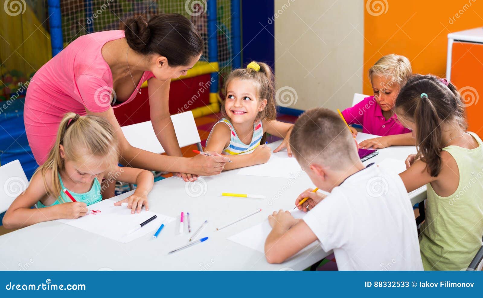 Children Sitting Together and Drawing in Class at School Stock Image ...