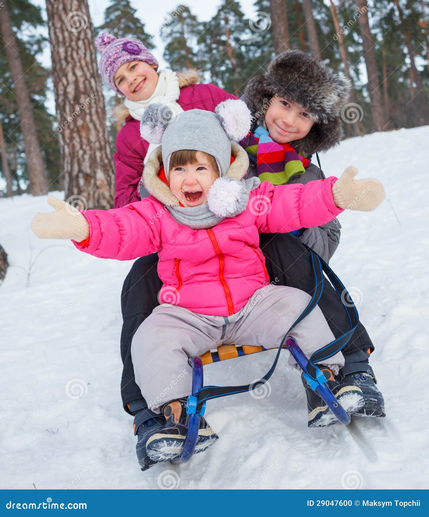 Children on sleds in snow stock photo. Image of leisure - 29047600