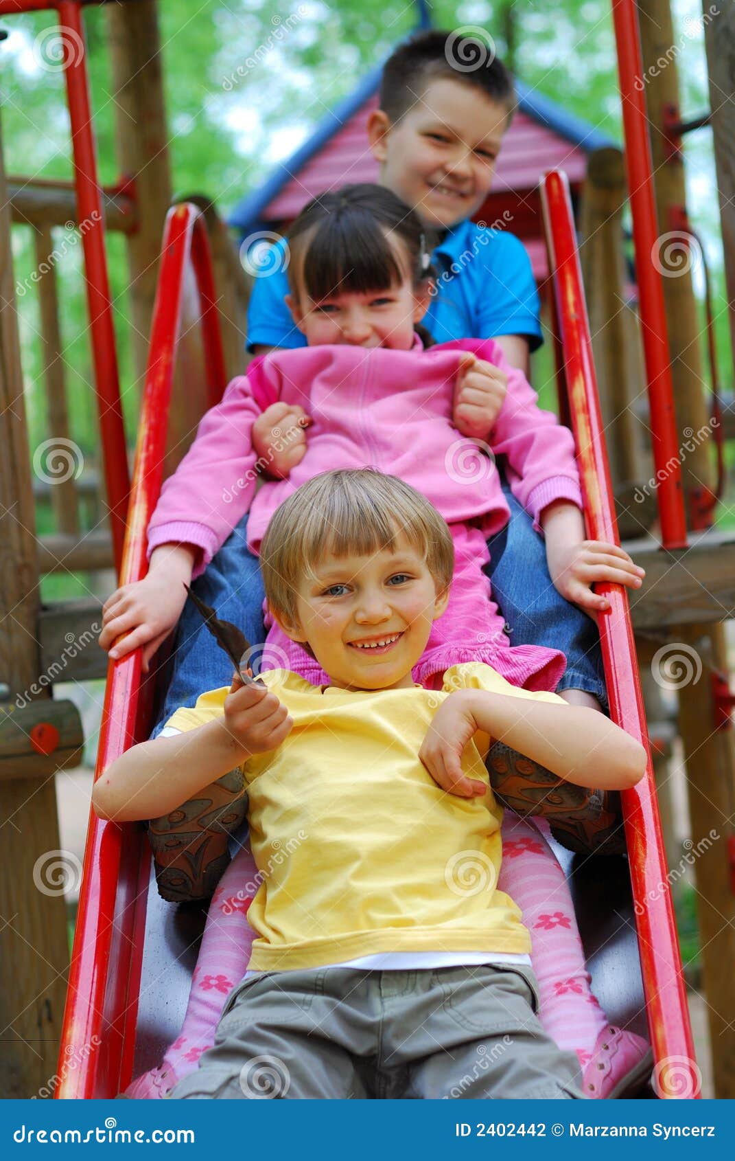 Children on Slide stock photo. Image of park, three, family - 2402442