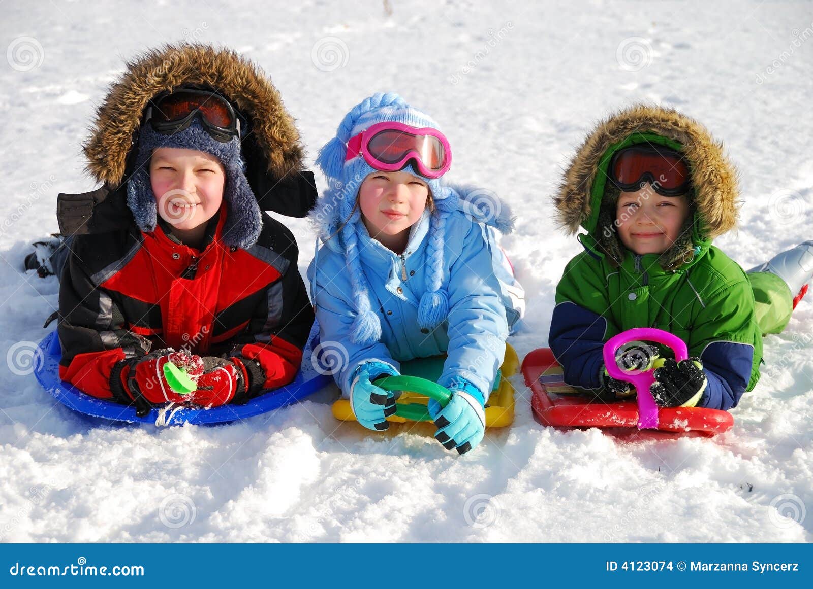 Children with slides stock photo. Image of sled, colorful - 4123074