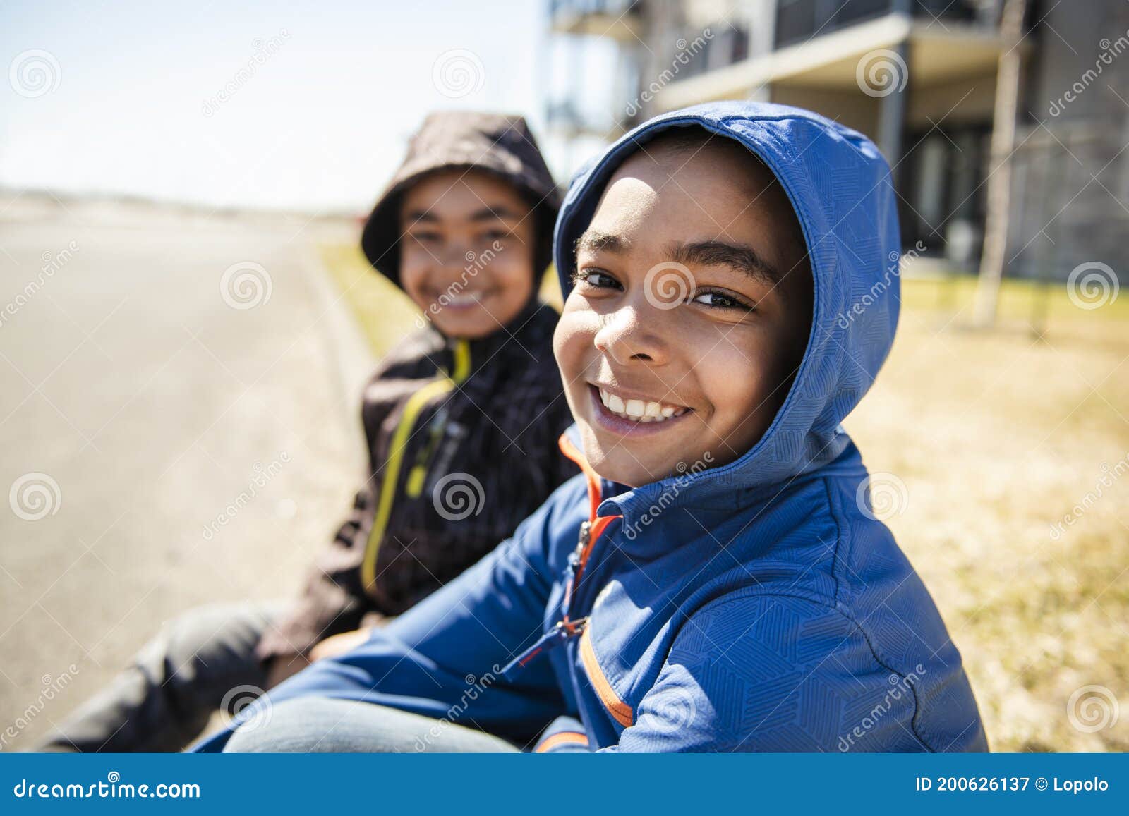 The Children Smiling Outside in Spring Season with Coat Stock Image ...