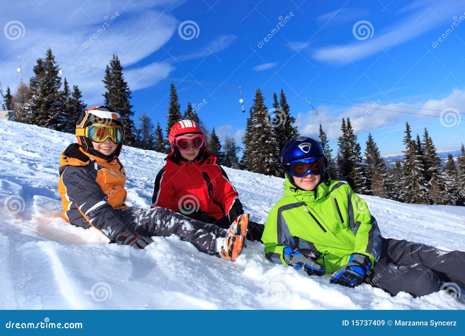 Children on a snowy slope stock image. Image of boys - 15737409