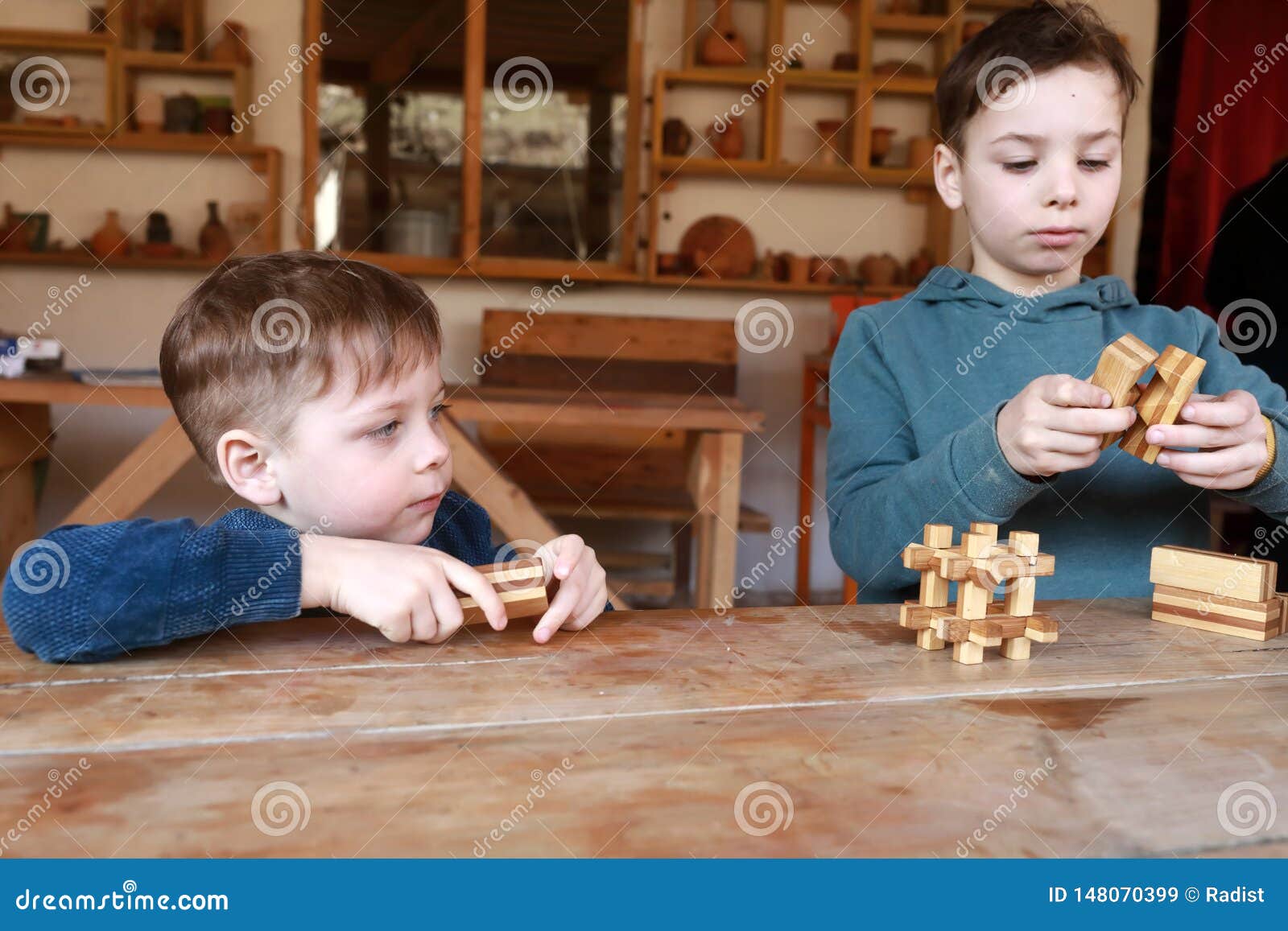 Children Solves Wooden Puzzle Stock Image - Image of logic, activity ...