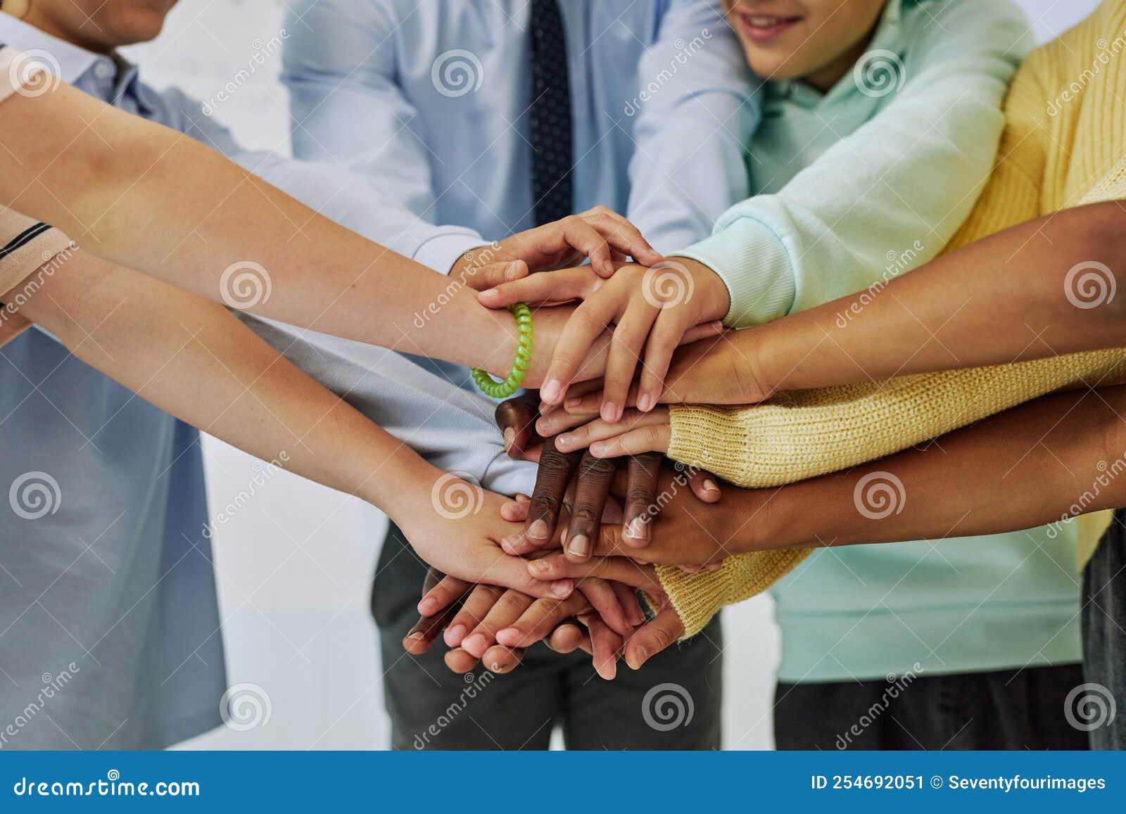Children Stacking Hands stock image. Image of teen, huddling - 254692051