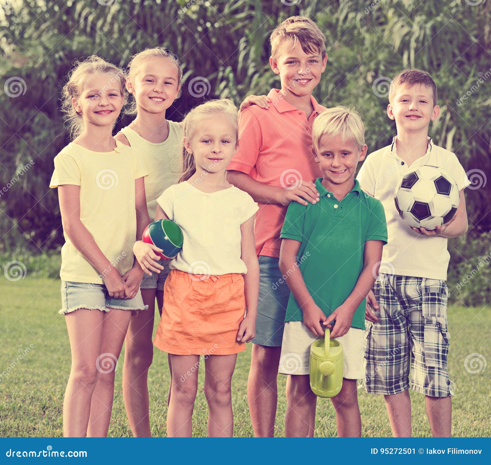 Children Standing Outdoors on Sunny Day Stock Image - Image of grass ...