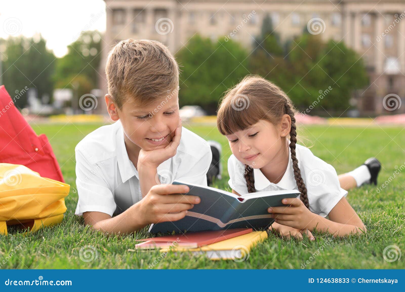 Children with Stationery Doing School Assignment Stock Image - Image of ...