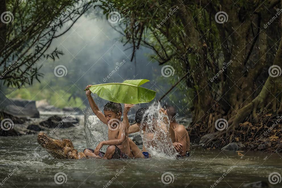 Children in the streams stock photo. Image of freedom - 73428140