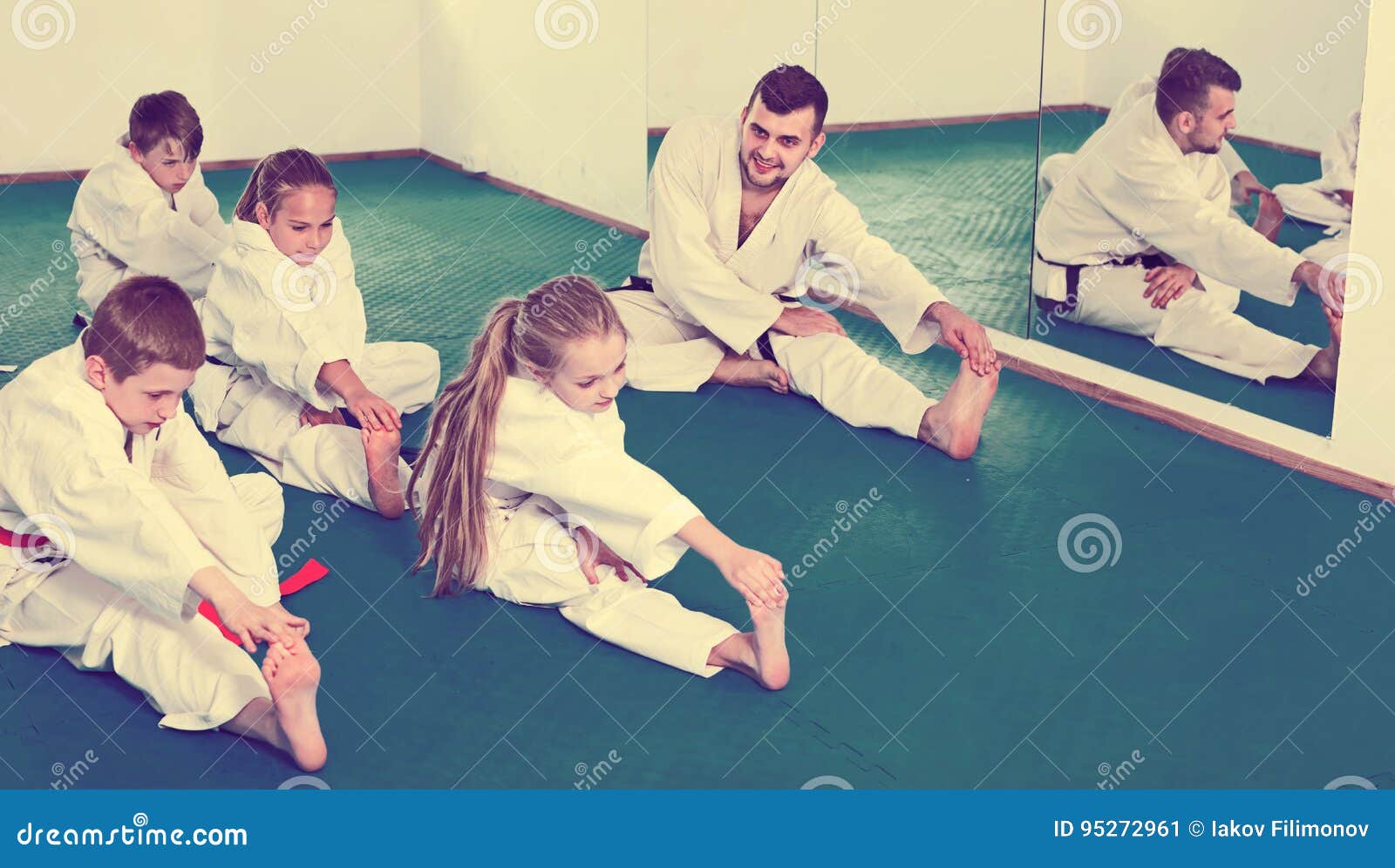 Children Stretching before Karate Class Stock Image - Image of ...