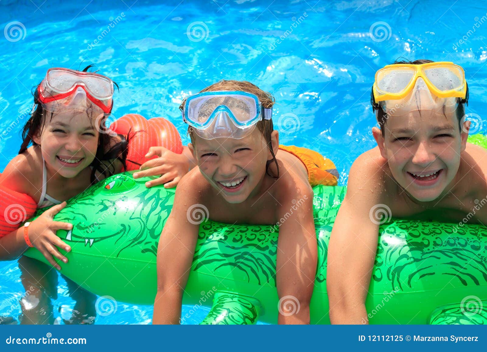 Children In Swimming Pool Royalty Free Stock Photo - Image: 12112125