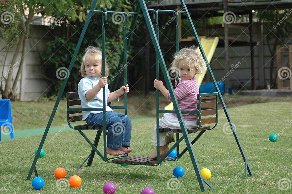 Children on swing stock image. Image of double, female - 3674275