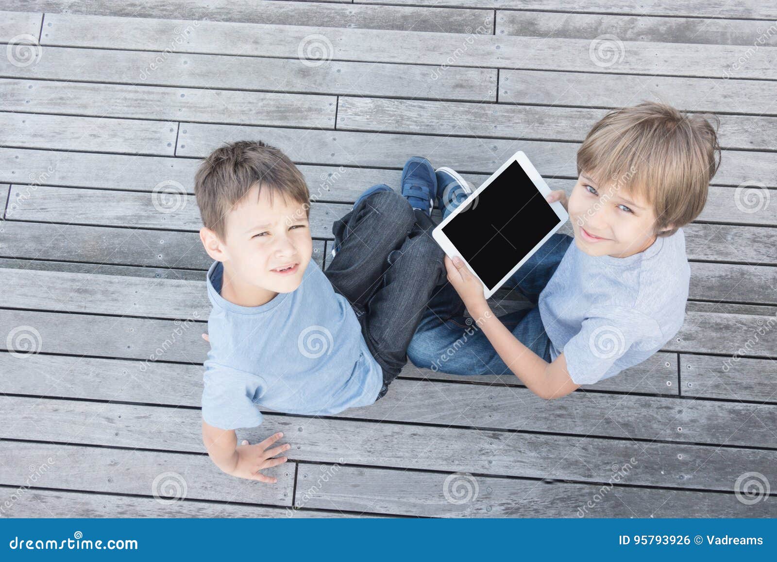 Children with Tablet Computers Outdoors. Top View Stock Photo - Image ...