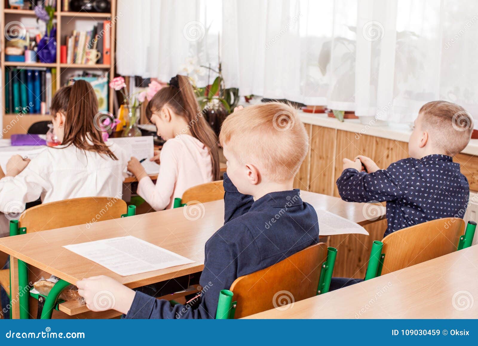 Children taking an exam stock image. Image of primary - 109030459