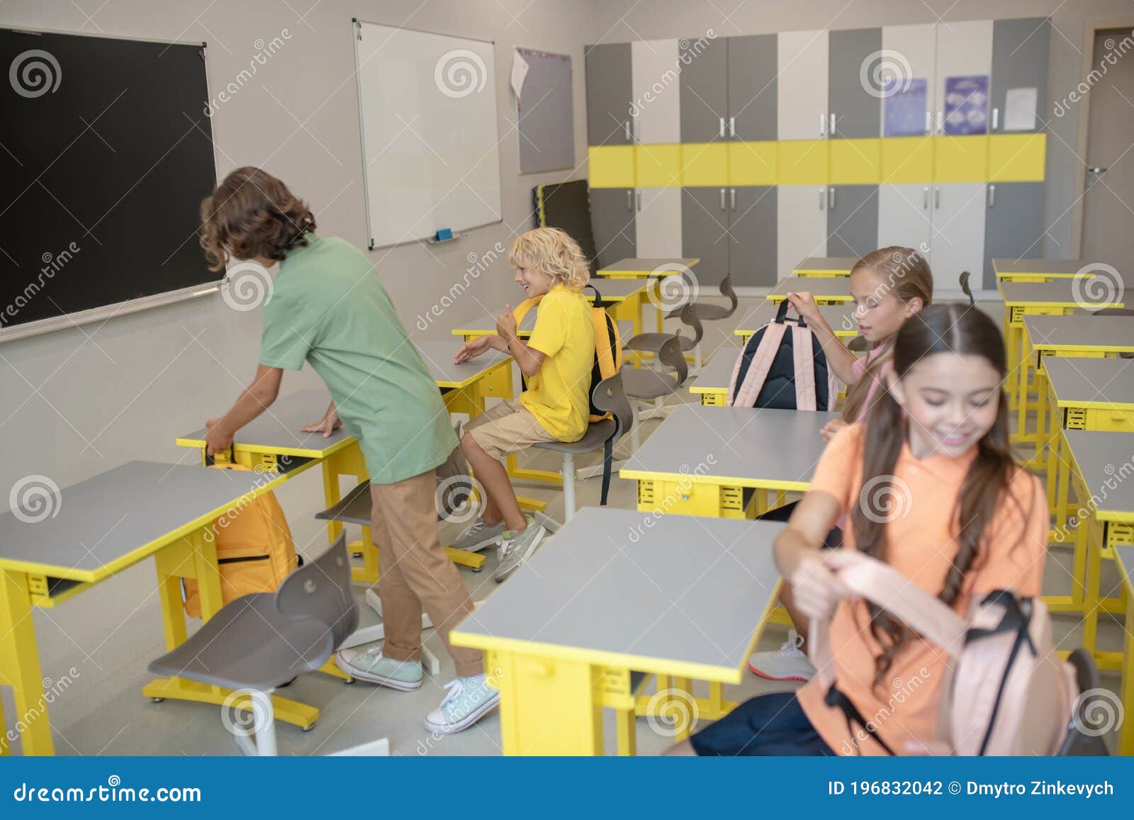 Children Taking Their Seats and Getting Ready for the Lesson Stock ...