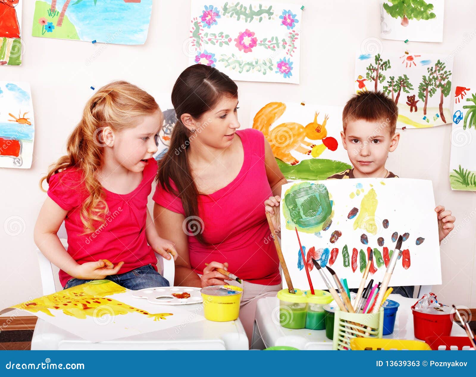Children with Teacher Draw Paints in Classroom. Stock Image - Image of ...