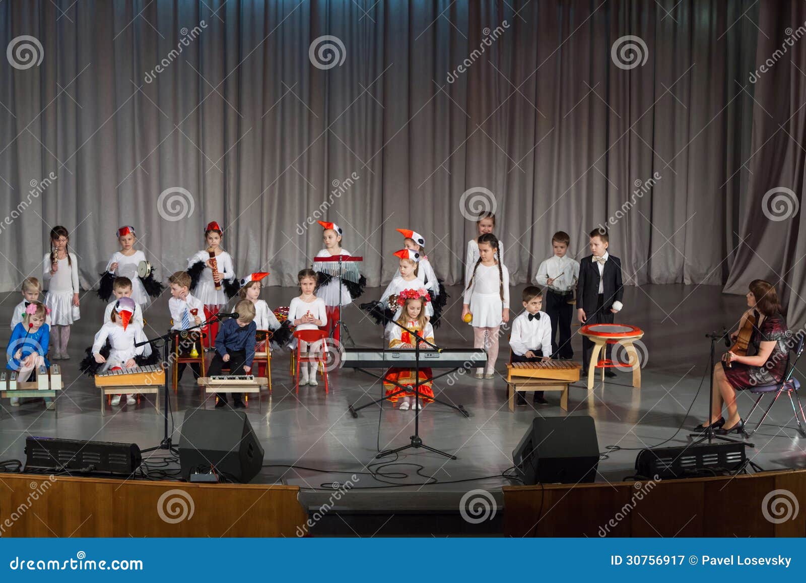 Children Teacher Playing Traditional Musical Instruments Stock Photos ...