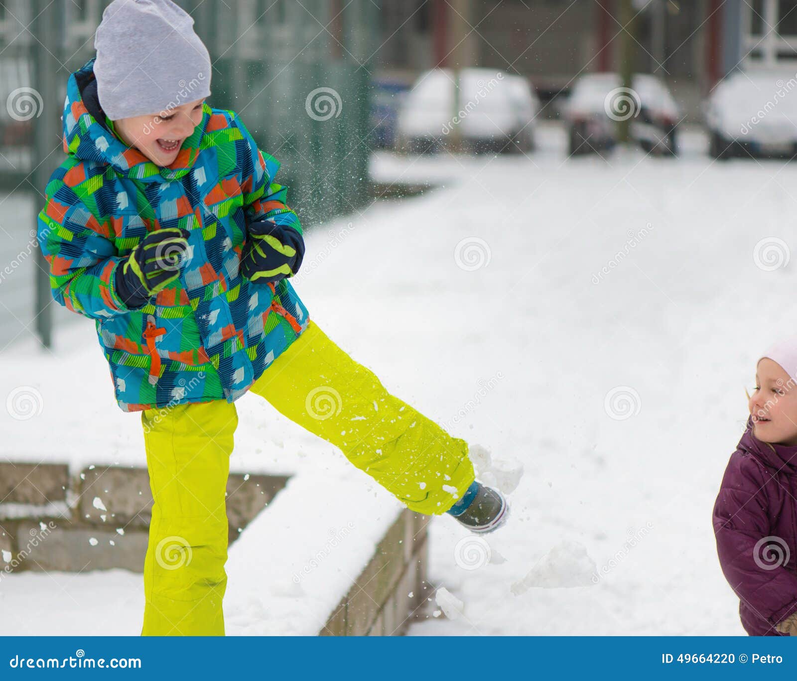 Children Throwing Snowballs Stock Photo - Image of december, outdoors ...