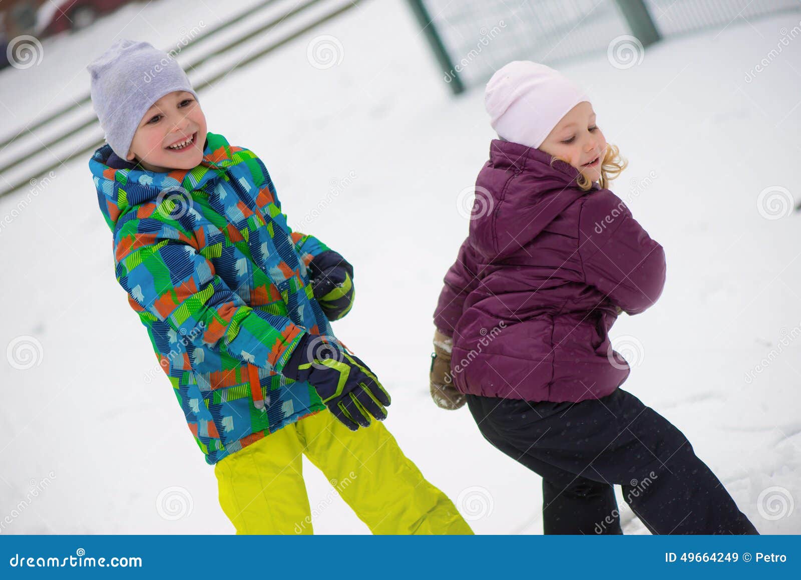 Children Throwing Snowballs Stock Image - Image of sister, active: 49664249