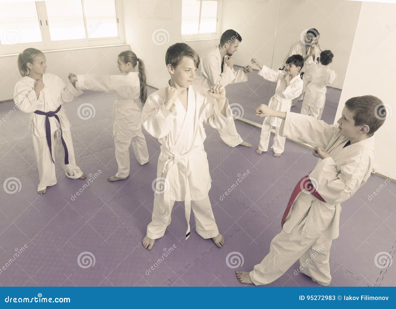 Children training in pairs stock image. Image of adult - 95272983