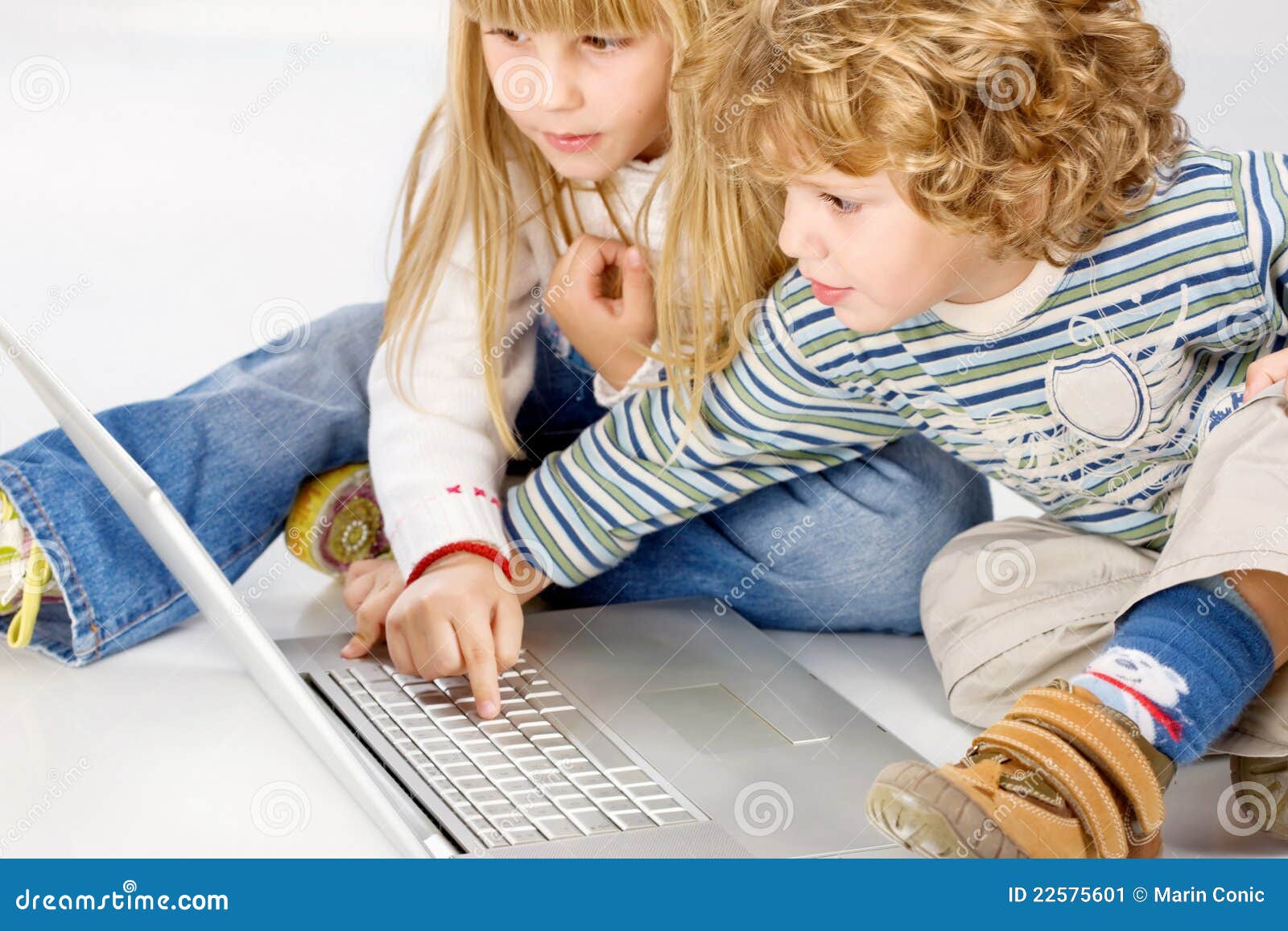 Children Turning on Computer Stock Image - Image of explore, girl: 22575601