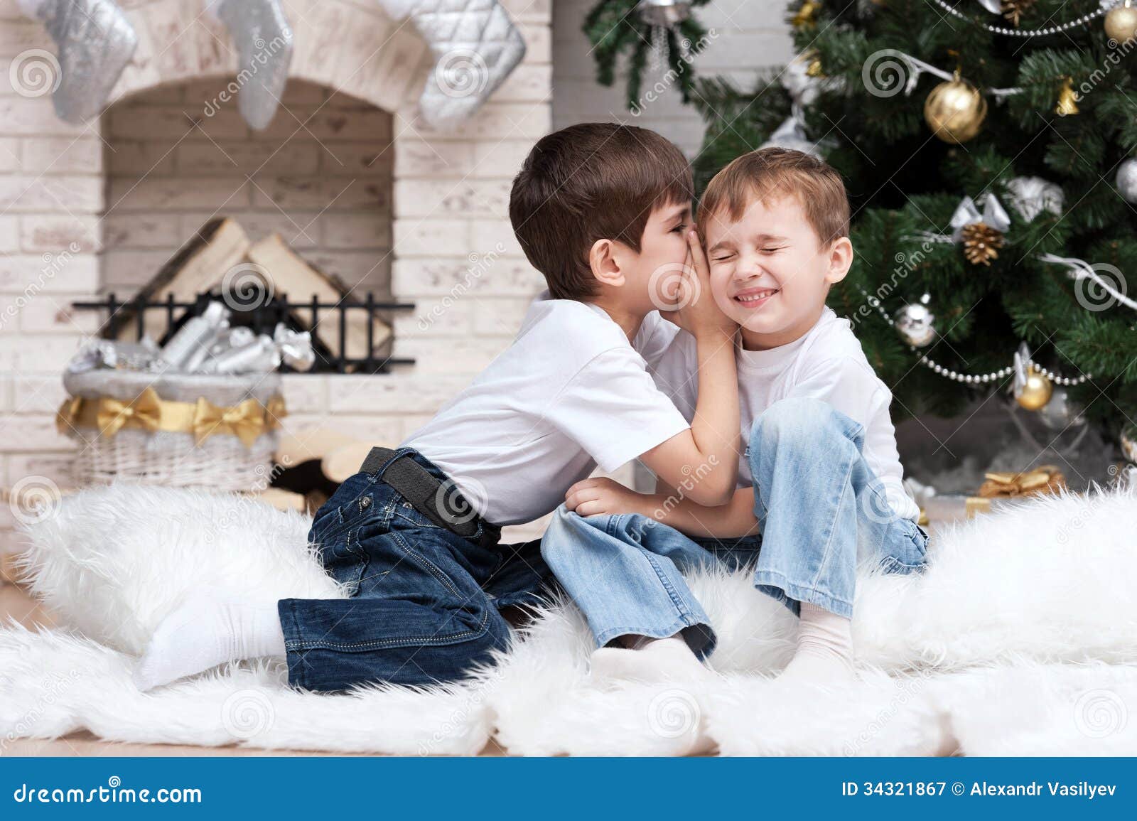 Children Under the Christmas Tree by the Fireplace Stock Image - Image ...