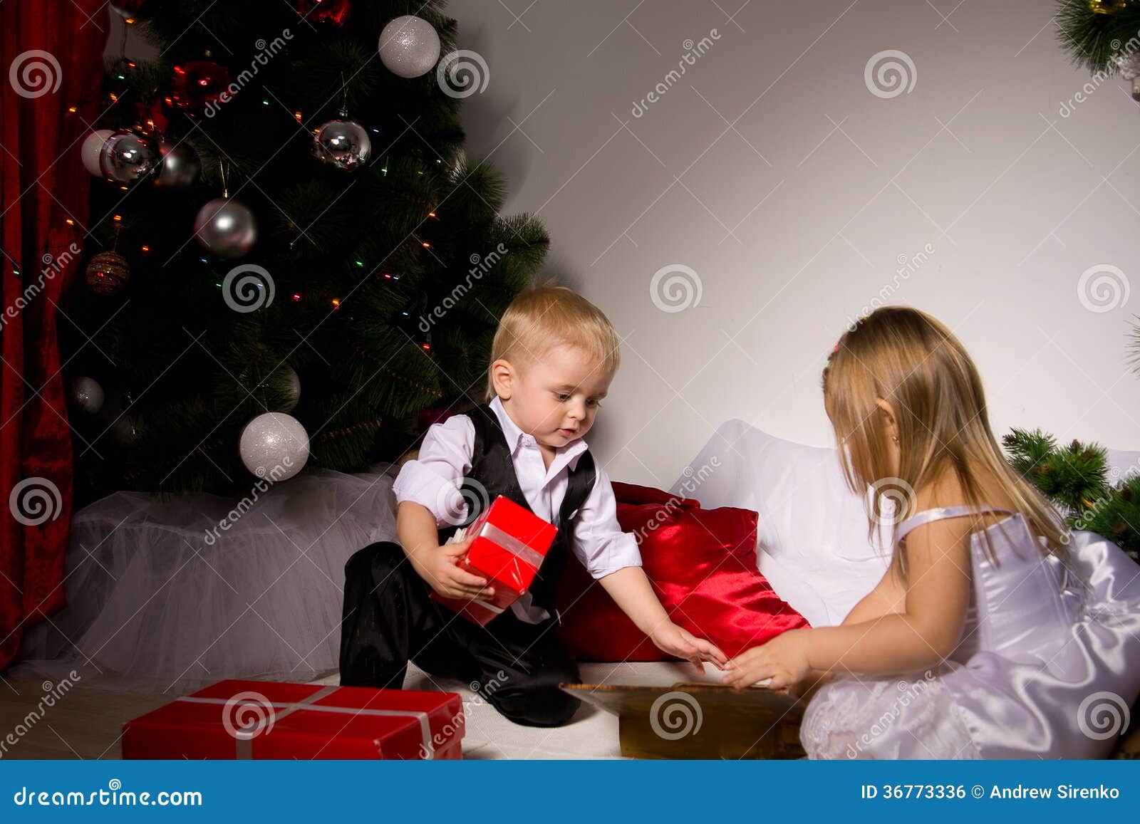 Children unpack gifts stock photo. Image of pretty, room - 36773336