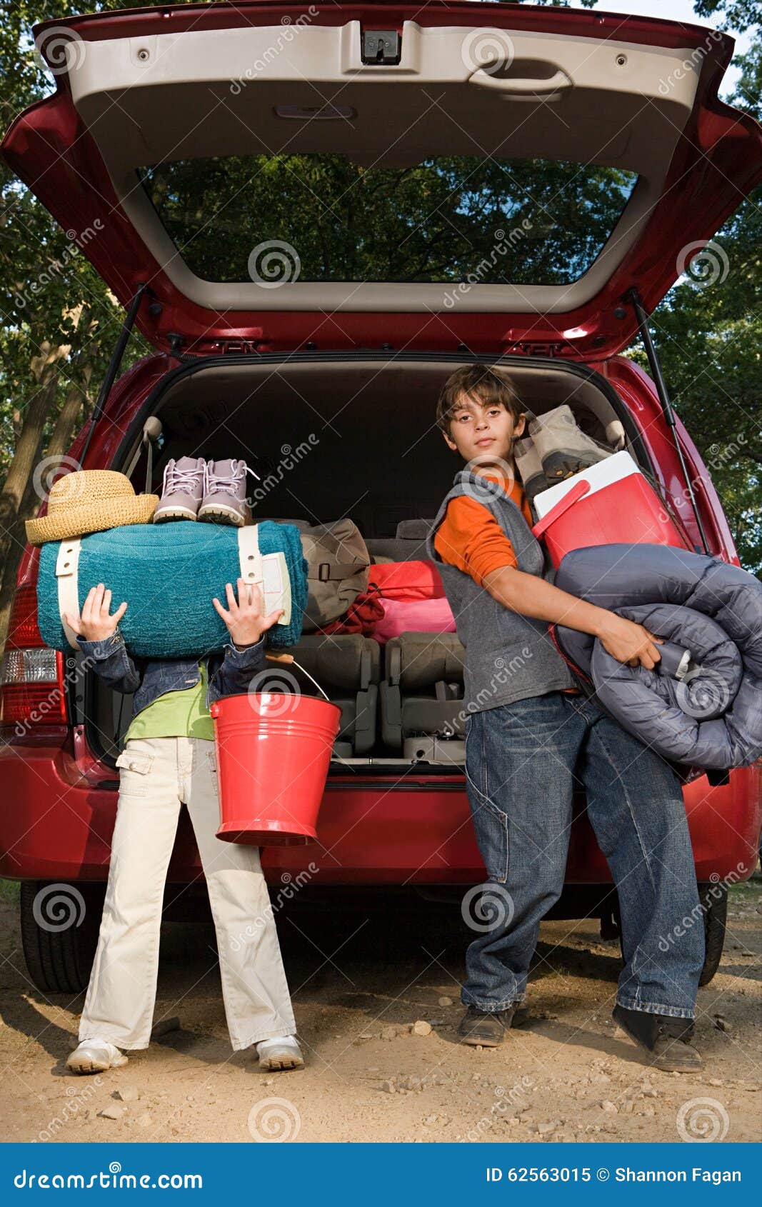Children unpacking car stock image. Image of discovery - 62563015