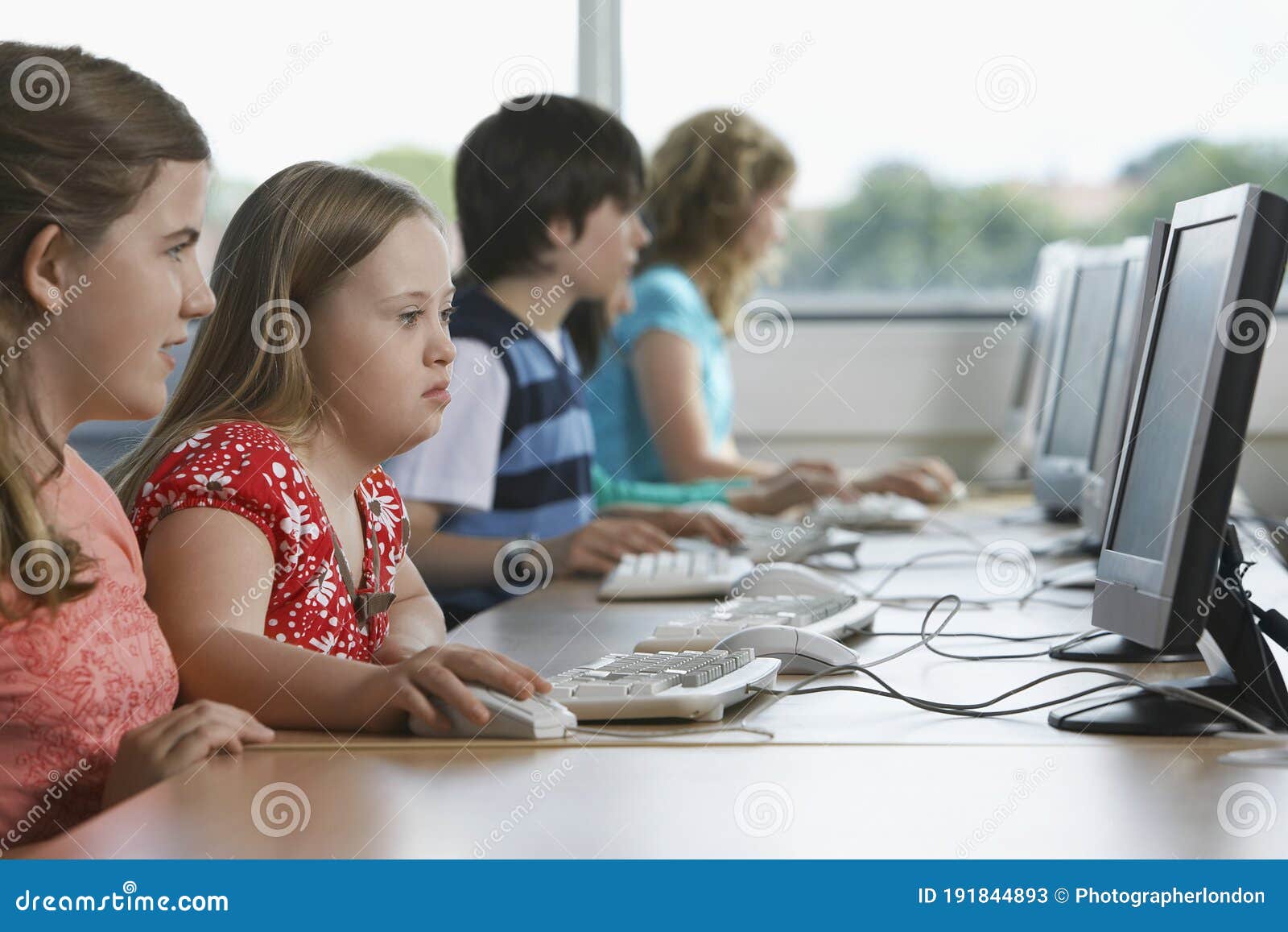 Children (10-12) Using Computer in Computer Lab Stock Image - Image of ...