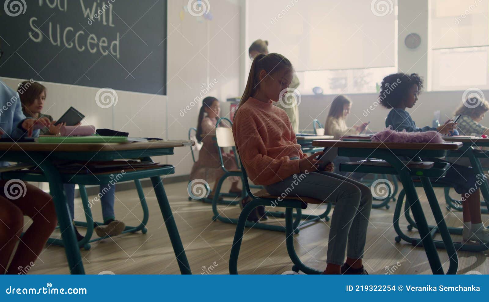 Children Using Digital Tablets at Lesson. Girl Holding Tablet Computer ...