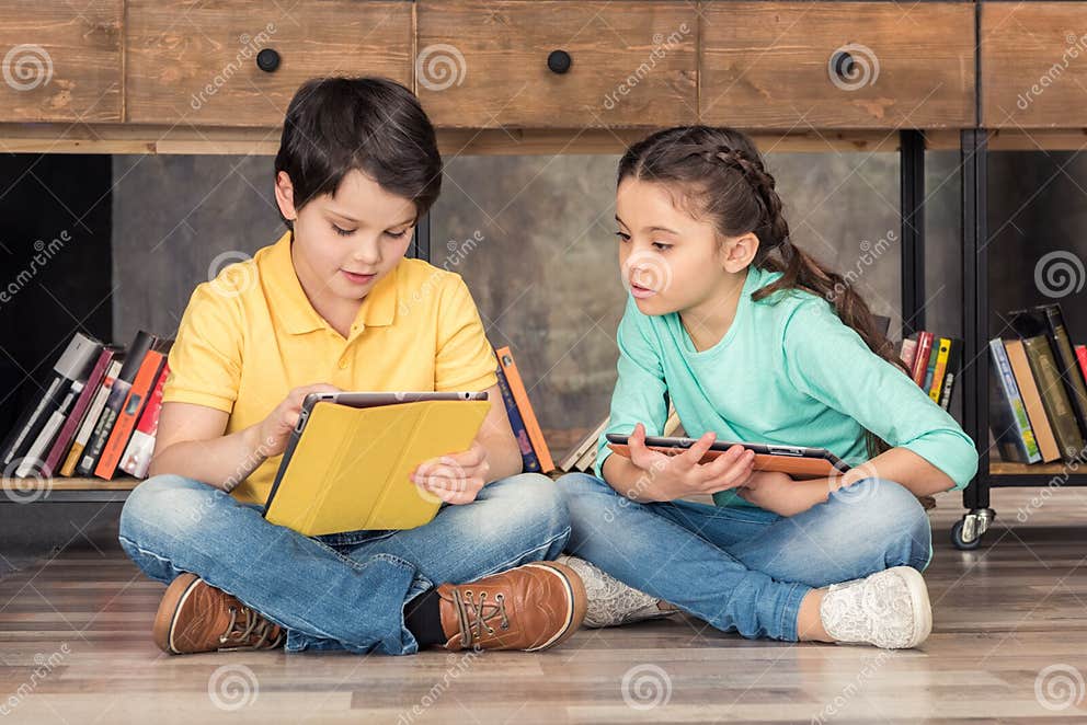 Children Using Digital Tablets Stock Image - Image of library ...